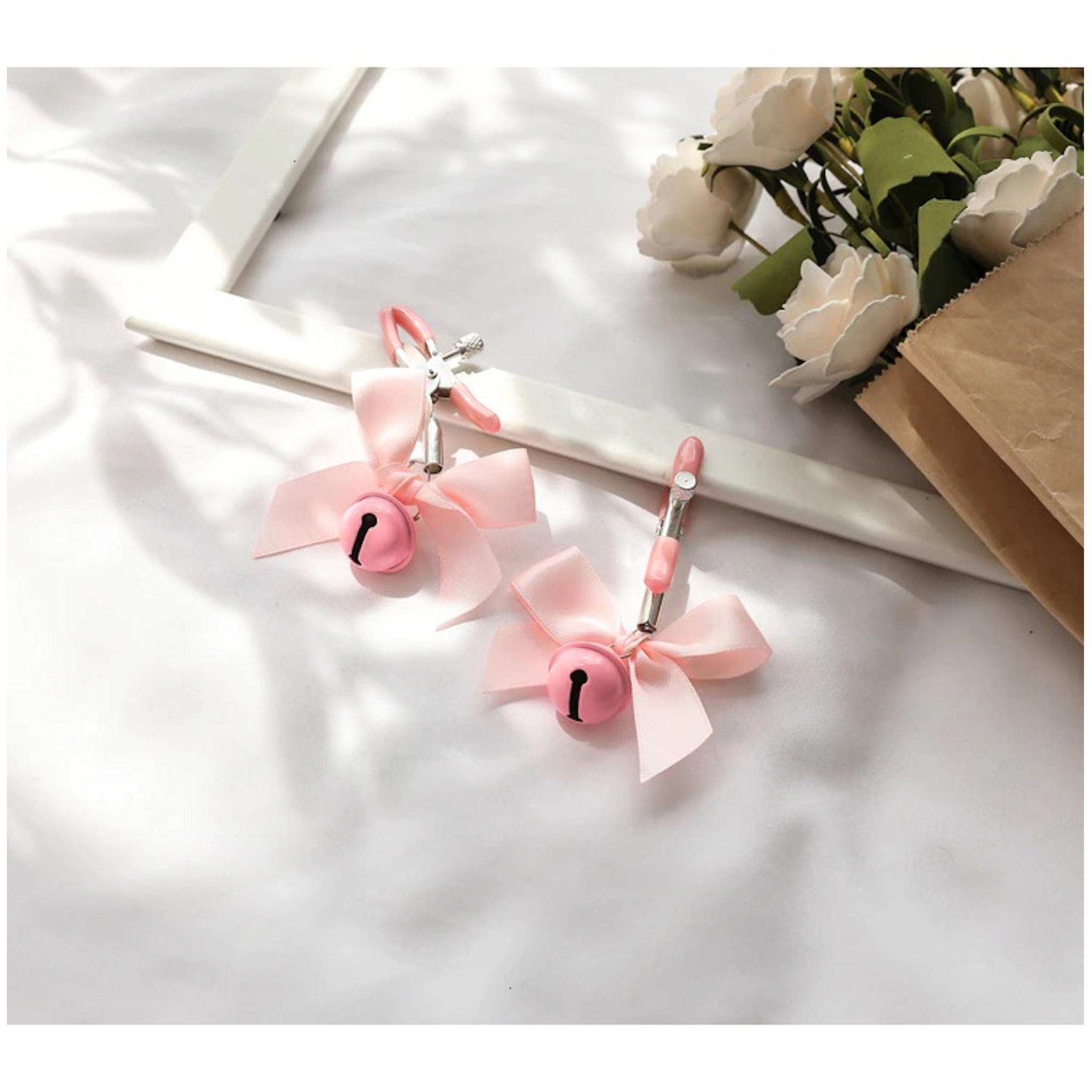 Nipple Clamps with pink bows and Bell. Adjustable.